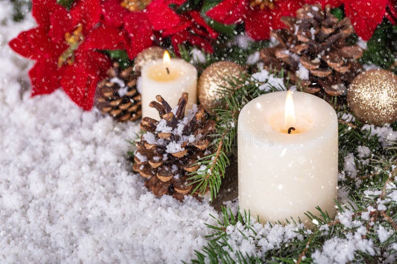 Snowy Scene with Candles and Holiday Decor Stock Photo - Image of ...