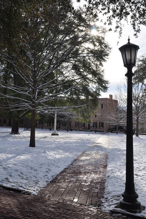 Snowy Sidewalk with a Lantern Stock Photo - Image of direction ...