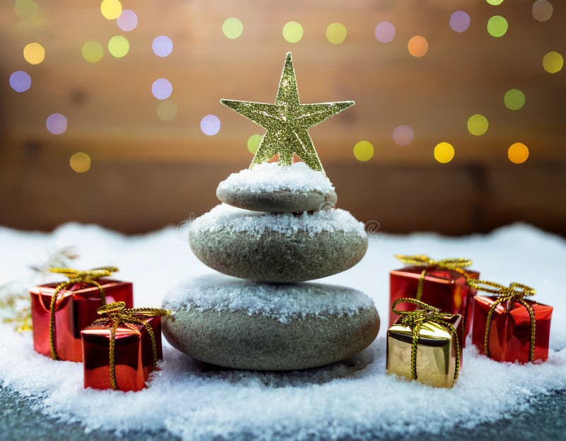 Snowy Stack of Pebbles Topped with Christmas Star and Surrounded by ...