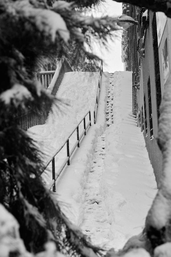 Snowy Stairs with Footsteps Stock Photo - Image of city, railing: 207908852