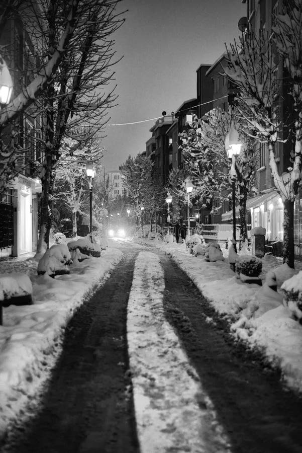 Snowy street at night stock photo. Image of cold, outdoor - 49406100