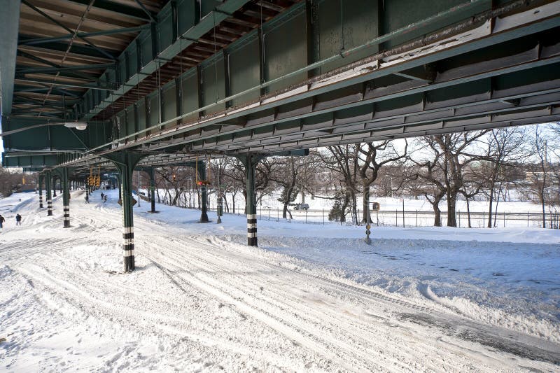 Snowy Street Underneath Train Tracks Stock Image - Image of snowy ...