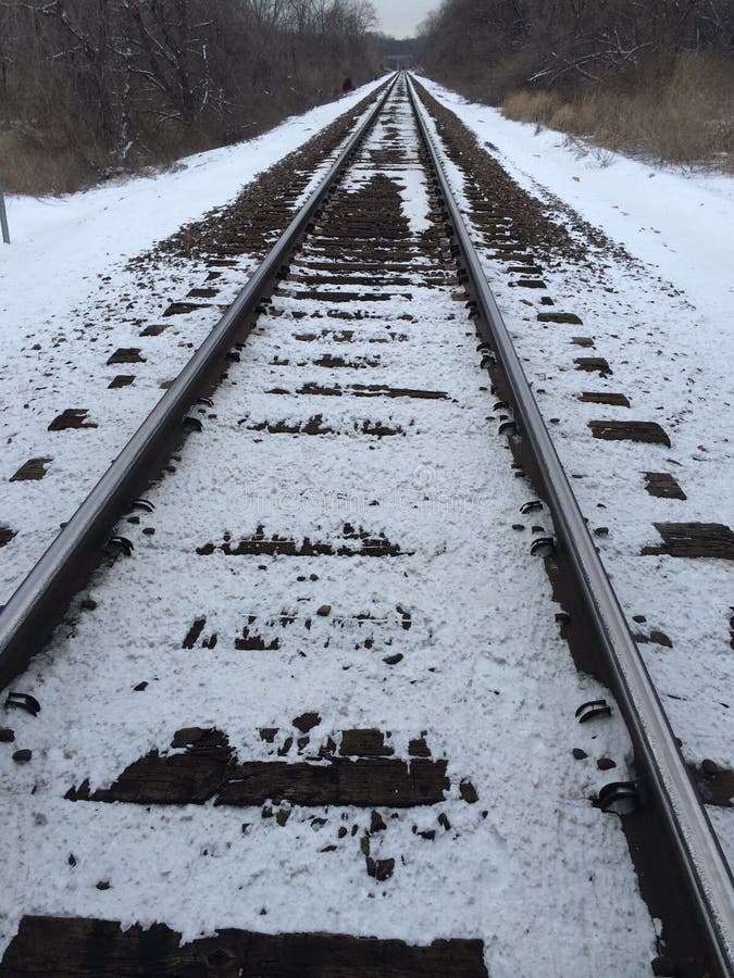 Snowy train tracks stock image. Image of train, snow - 50361509