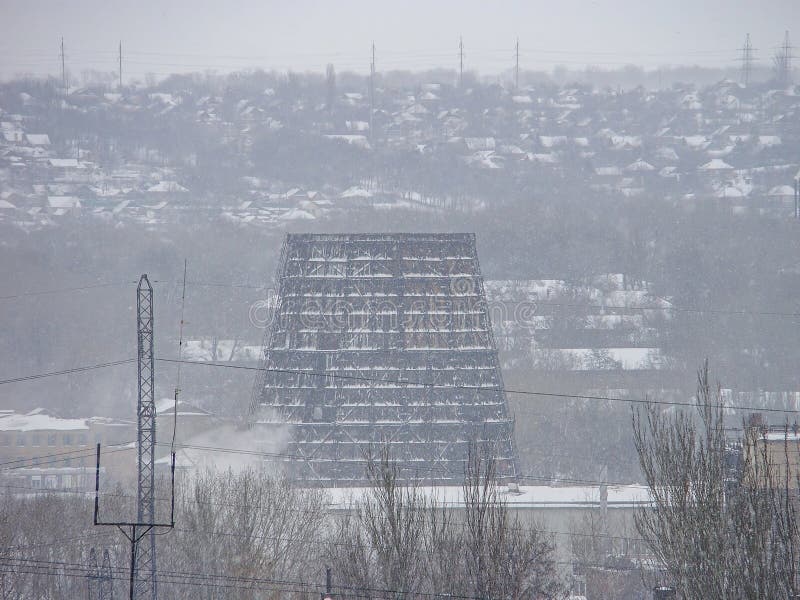 A Snowy, Under-construction Building with Unique Architectural Design ...