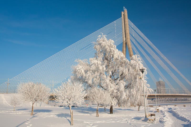 Snowy winter with bridge stock image. Image of landscape - 12795477