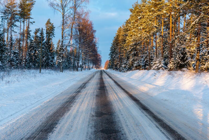 Snowy Winter Road Covered in Ice and Snow Stock Photo - Image of ...
