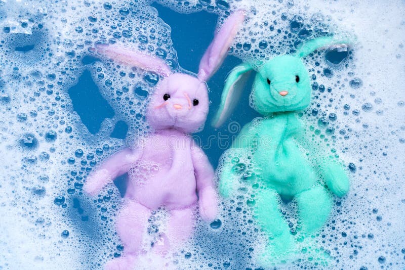Soak Rabbit Doll with Toy Teddy Bear in Laundry Detergent Water ...