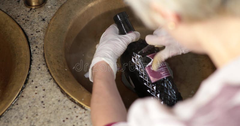 Soak and Remove Label from Glass Wine Bottle with Knife To Reuse Bottle ...