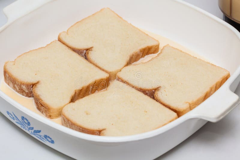 Soaking Bread in the Mix for French Toast Preparation Stock Image ...