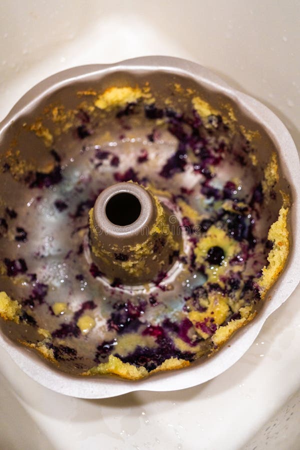 Washing Dirty Aluminum Bundt Cake Pan Stock Image - Image of cabinet ...
