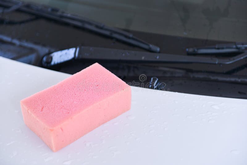 Soaky Pink Sponge on a Surface of Car Stock Photo - Image of gloss ...