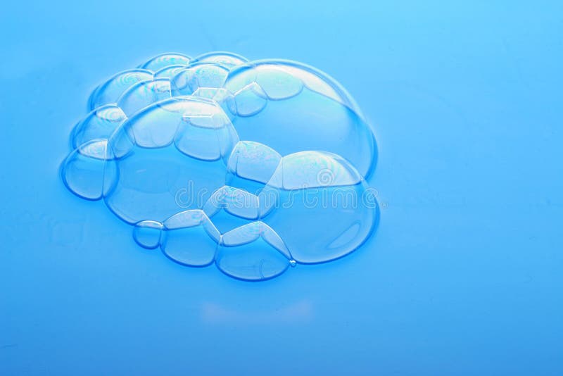 Soap bubbles on blue water stock photo. Image of caducity - 309462718