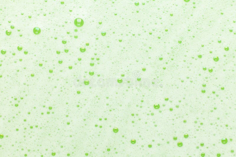 Soap Bubbles and Bulbs on a Green Background. Natural and Organic ...