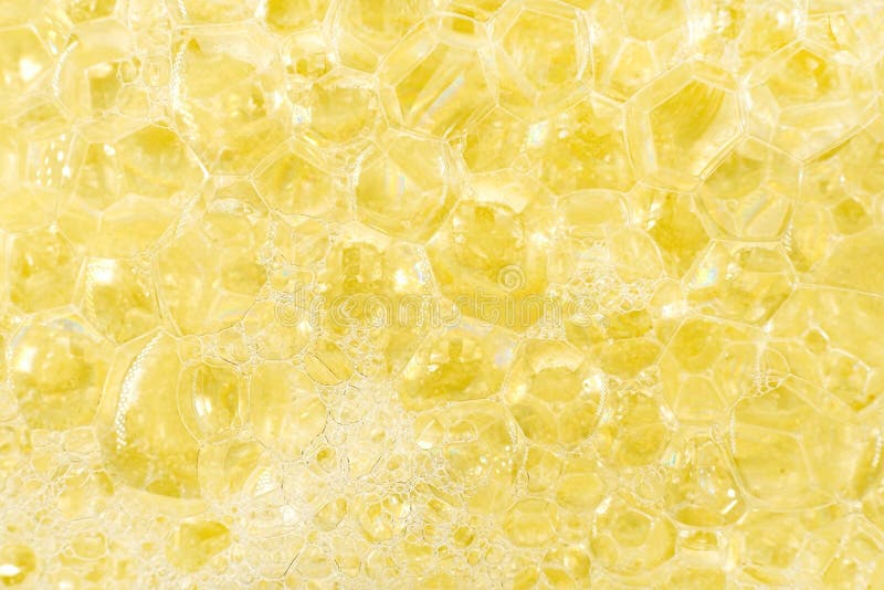Soap Foam Close-up. Texture of Soapy Shampoo in Yellow Color Stock ...