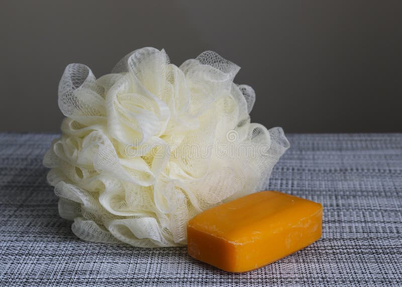 Soap and sponge. stock photo. Image of orange, bathroom - 143640228
