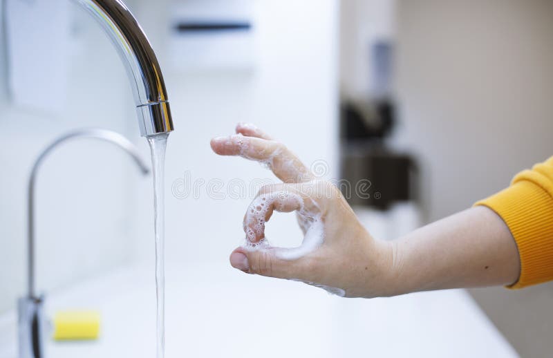 Soapy hand shows ok stock image. Image of bubble, water - 176998881