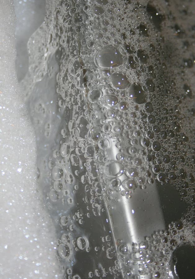 Soapy Water Overflowing 1 stock image. Image of bubbling - 95043399