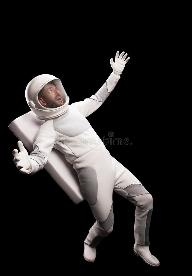 Experienced Astronaut is Standing and Looking with Astonishment Up ...