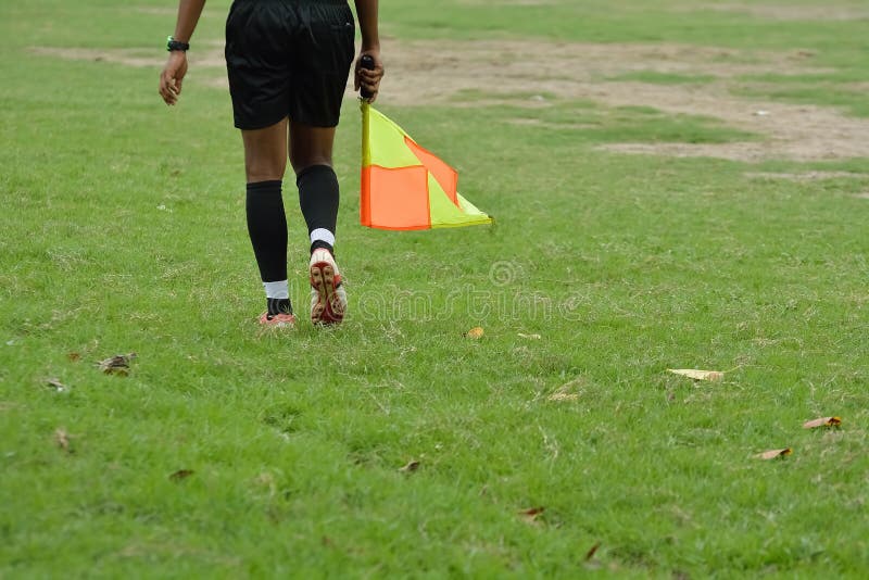 Soccer assistant referee stock image. Image of grass - 108525485