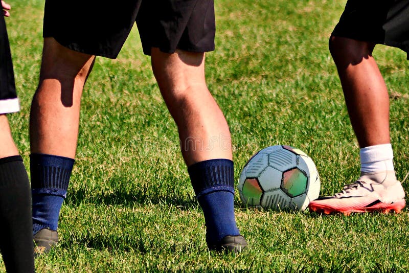Soccer Ball on Grass with Player Stock Image - Image of games, field ...