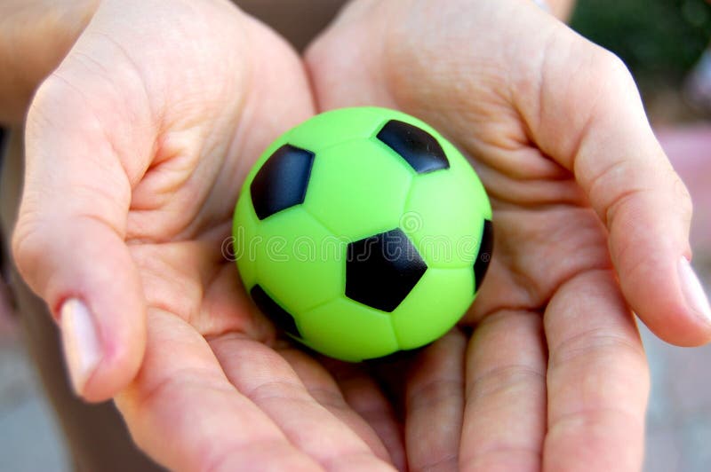 Soccer ball in hands stock image. Image of leisure, circle - 6033943