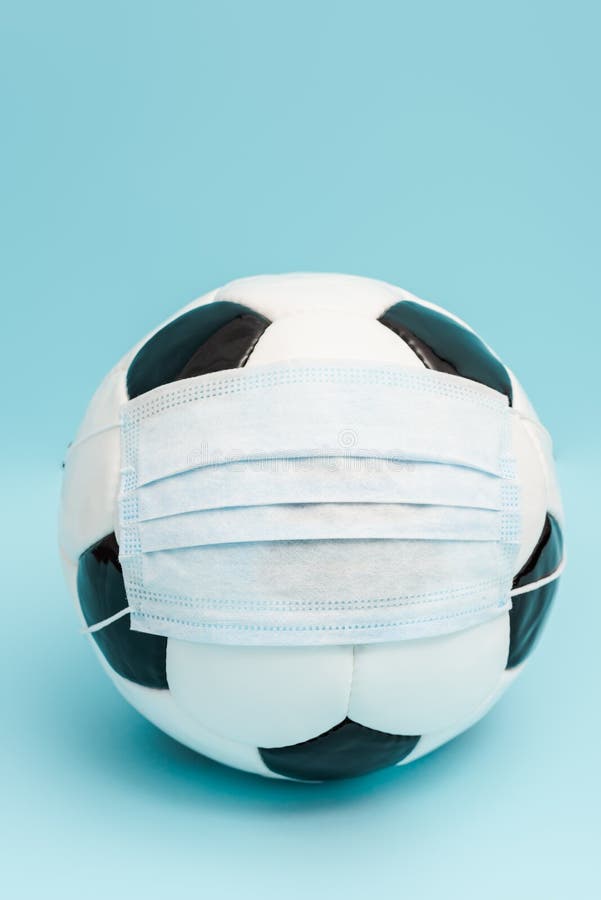Soccer Ball in Medical Mask Stock Image - Image of equipment, sport ...