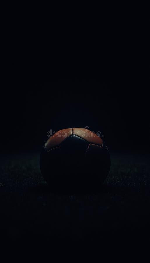 A Soccer Ball Placed on a Grassy Field, Highlighted by the Dramatic ...