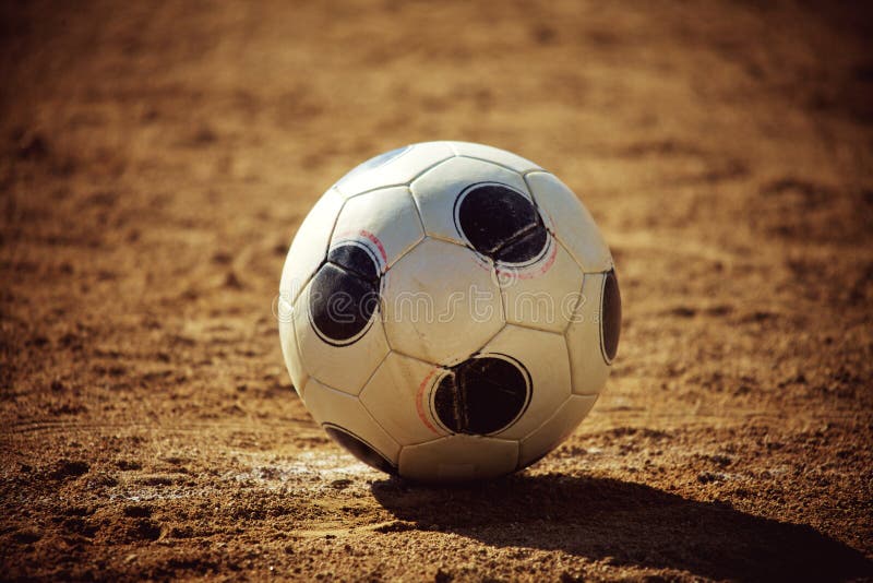 Soccer ball on sand field stock photo. Image of outdoors - 13941800
