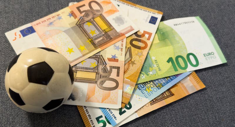 Soccer Ball on Stack of Euro Stock Photo - Image of money, business ...