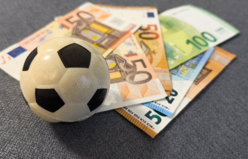 Soccer Ball on Stack of Euro Stock Photo - Image of banknote, bank ...