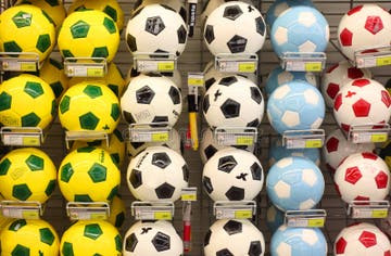 Soccer balls in store editorial photo. Image of shape - 21830211