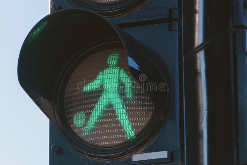 Soccer Concept, Pedestrian Traffic Light Man Kicking a Ball Stock Photo ...