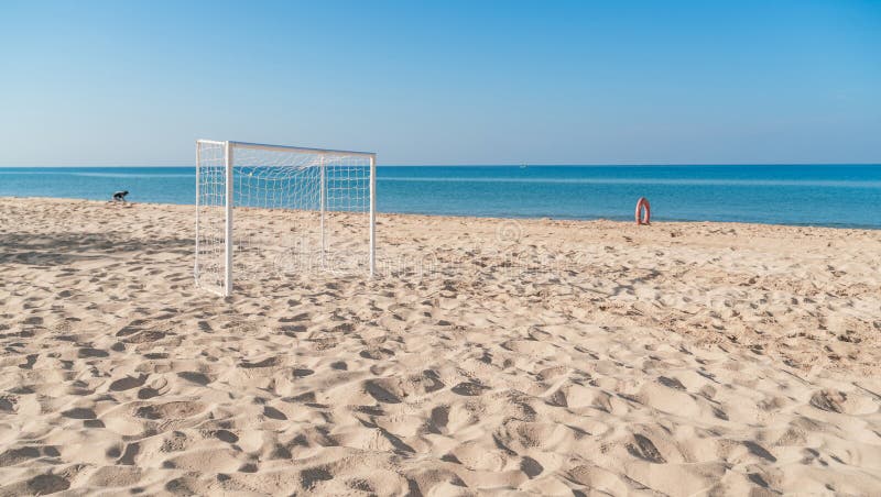 Soccer Goal Post on the Beach with Sand and Blue Sky Stock Image ...