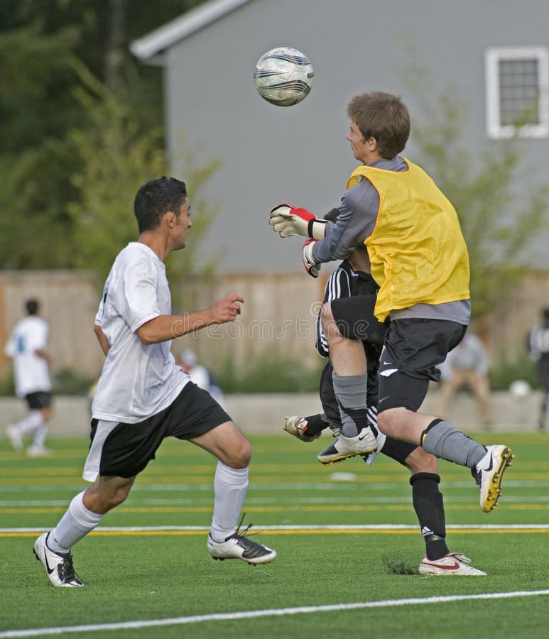 Soccer shot at the goal editorial stock photo. Image of junior - 6652183