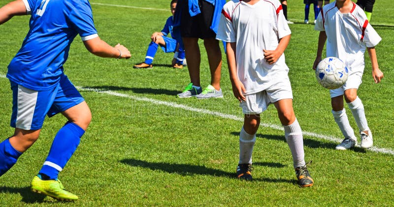 Soccer match stock photo. Image of sport, blue, playing - 61792914