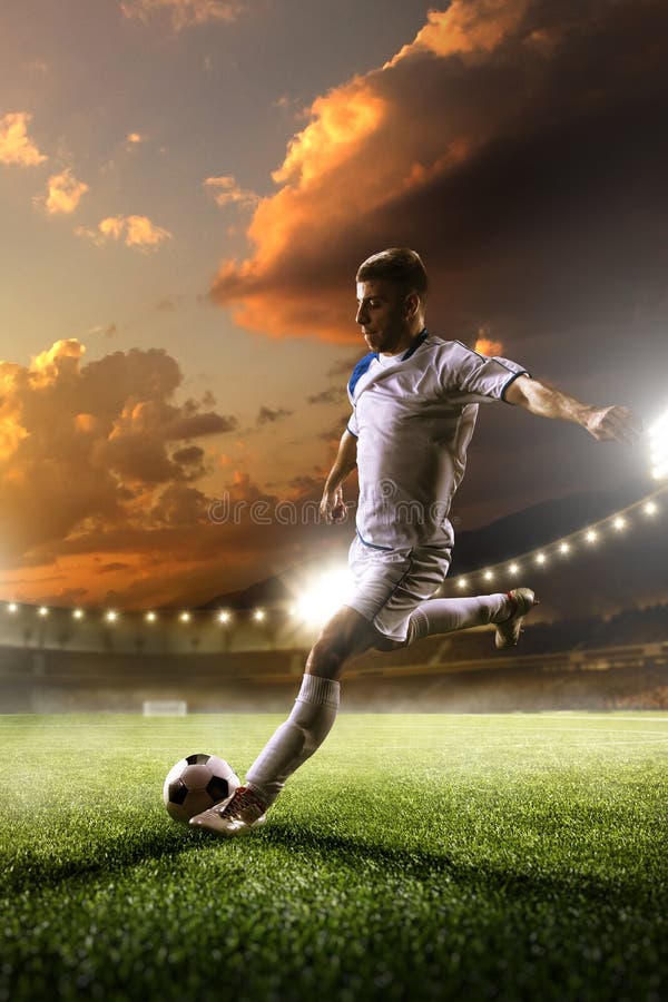 Soccer Player in Action on Sunset Stadium Background Stock Image ...
