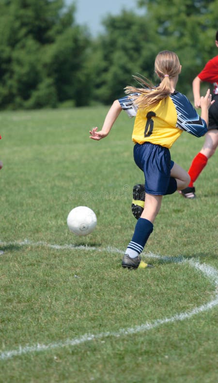 Soccer Player Chasing Ball 4 Stock Image - Image of grass, team: 2791715