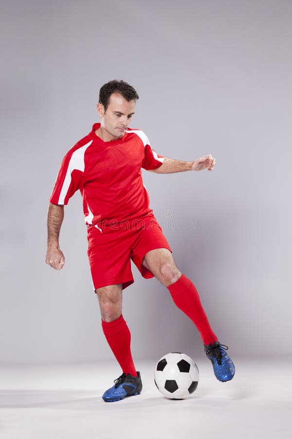 Soccer Player in the Studio Stock Photo - Image of studio, athletic ...