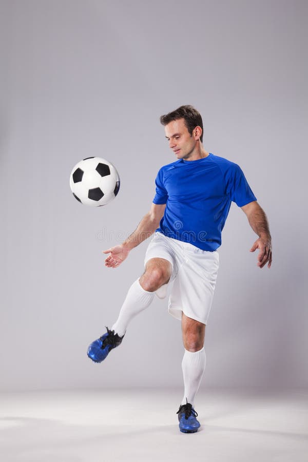 Soccer Player in the Studio Stock Image - Image of shoot, play: 299875105