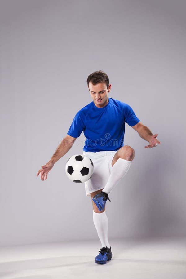 Soccer Player in the Studio Stock Image - Image of male, shoot: 299875111