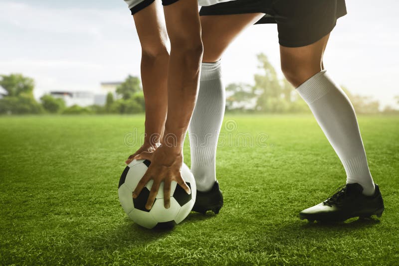 Soccer Player Holding Ball on the Fields Stock Photo - Image of event ...