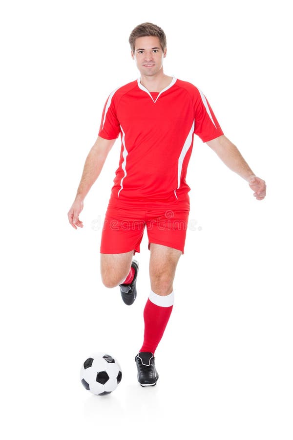 Soccer Player Kicking Football Stock Photo - Image of sports, play ...