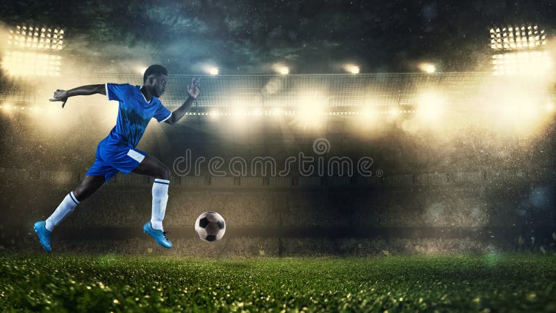 Soccer Player in Blue Uniform Sprinting Fast with the Ball at the ...