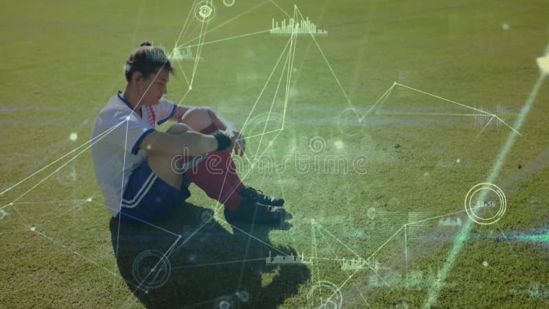 Soccer Player Sitting on Field with Digital Data Processing Animation Overlay Stock Video ...