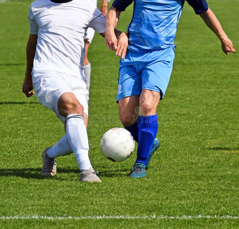 Soccer Players in Action on the Field Stock Photo - Image of soccer ...