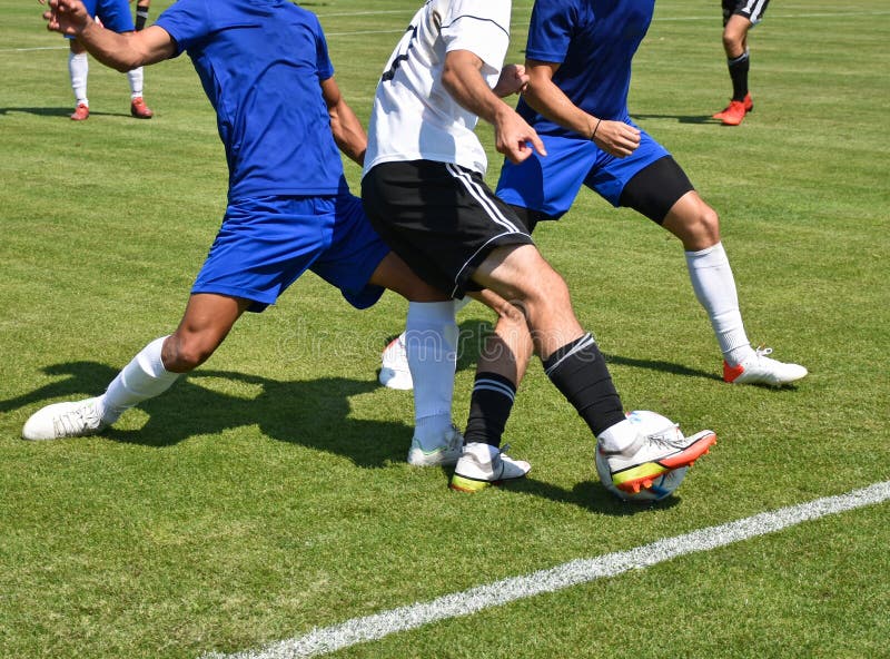 Soccer Players in Action Outdoor Match Stock Photo - Image of blue ...