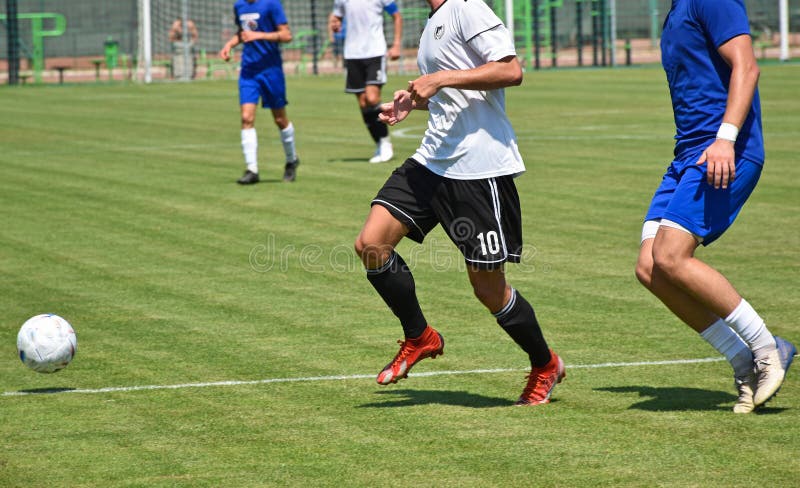 Soccer Players in Action Outdoor Match Stock Image - Image of football ...
