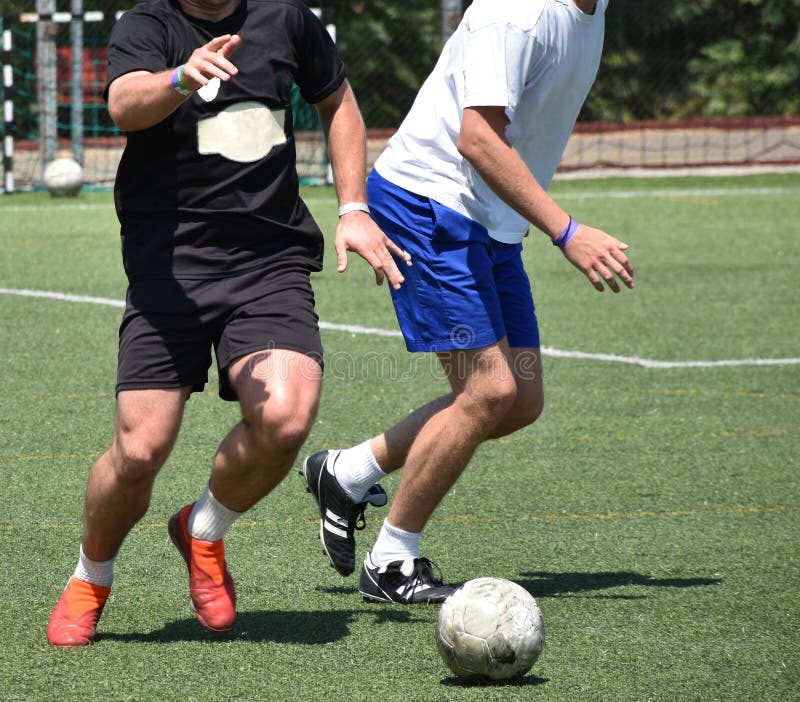 Soccer Players in Action Outdoor Match Stock Image - Image of soccer ...