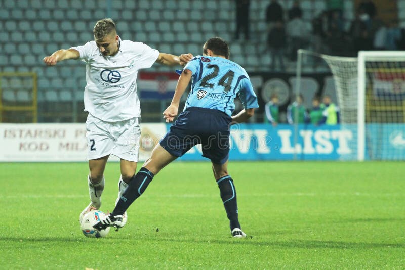 Soccer players in duel editorial stock photo. Image of penalty - 22421588