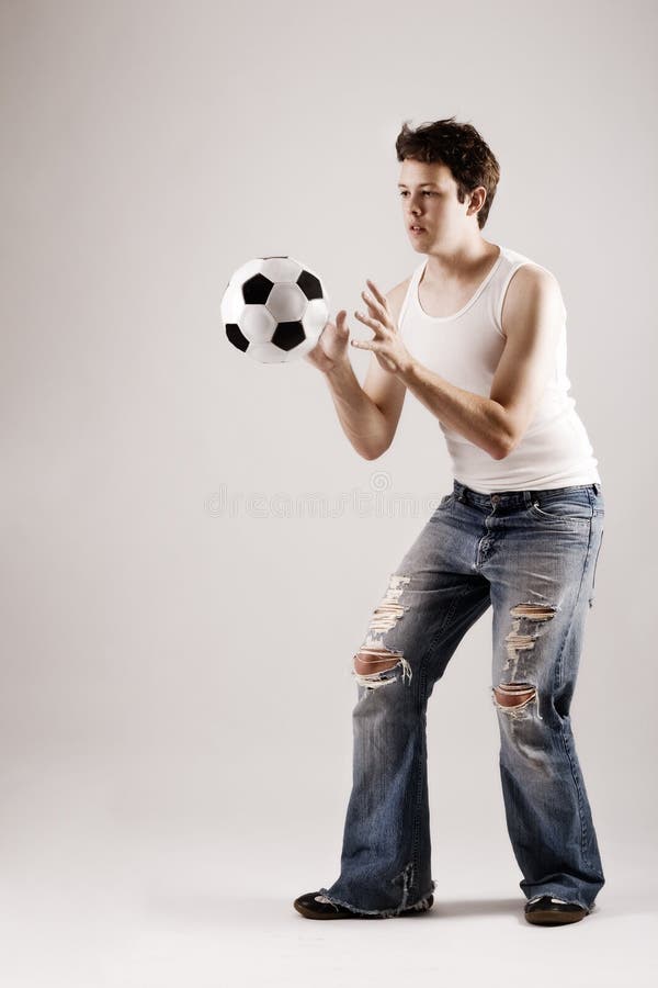 Soccer Playing Catching a Ball Stock Image - Image of leasure, kick ...